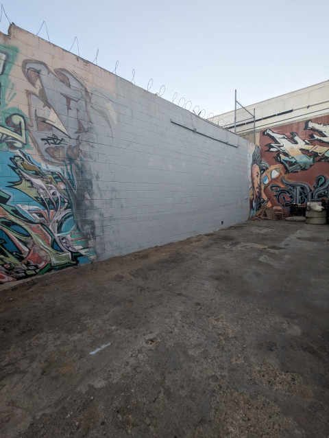 Industrial Creative Arts Space with Large projector wall, graffiti ...