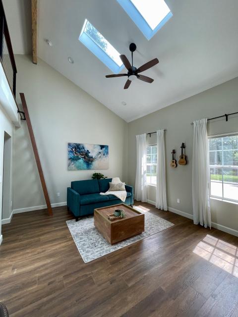 Bright and clean studio loft guest house with lush green outdoor space ...