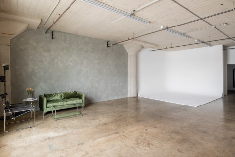 Natural Light Studio with Cyc Wall, Cement Style Wall, Equipment, and ...