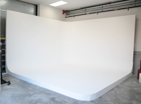 Cyclorama Wall Studio With a Large Commercial Roll-Up Door for Easy ...