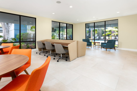 Bright Wi-Fi Lounge w/ View, Table & Chair Seating and Cubicle Break ...