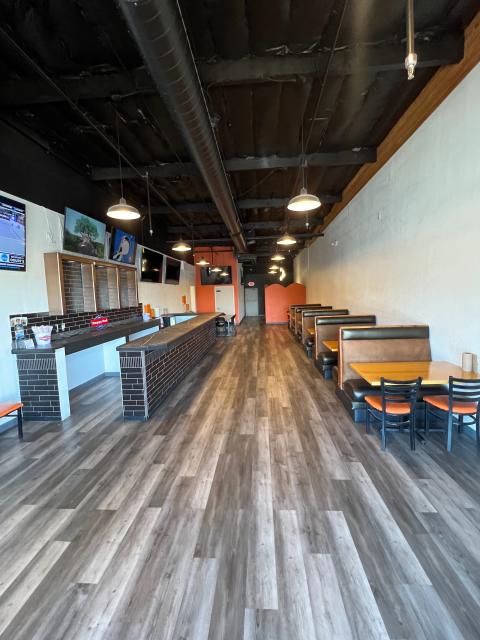 Mac Daddy Wingz & Cheeze | Large restaurant dining area with bar in ...