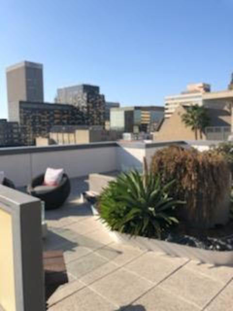 Modern club room with rooftop access and skyline views, Los Angeles, CA ...