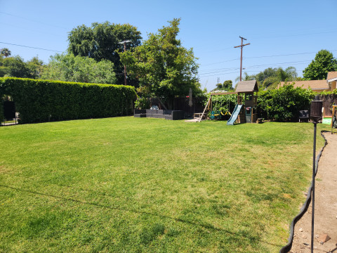 Private 6,000 Sq Ft Sanctuary: Spacious Lawn with Playground and Garden ...