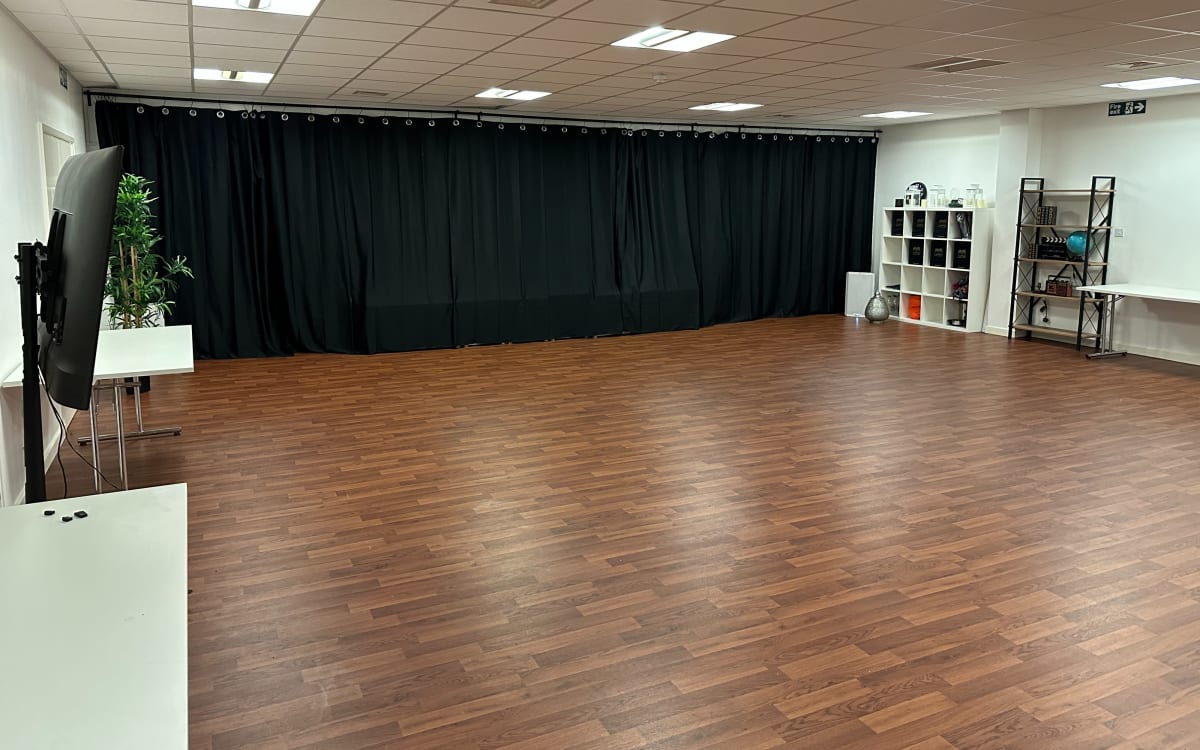 Large studio space with black curtains, London | Production | Peerspace