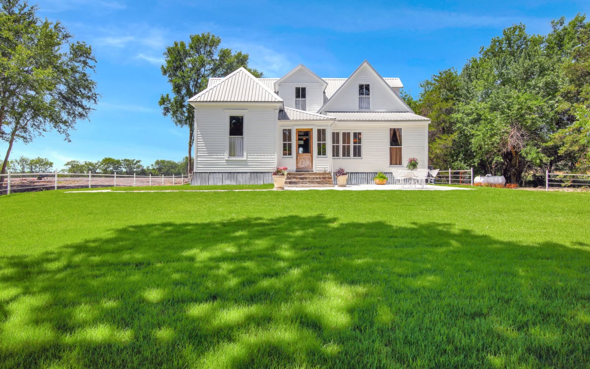 Charming 1905 farmhouse surrounded by large mature trees on secluded ...
