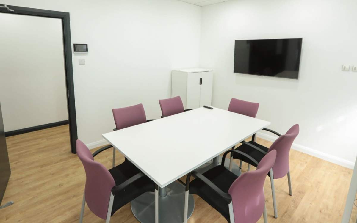 Small private meeting room with large presentation screen in Belfast ...
