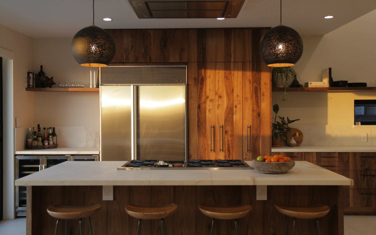 Hip view home. 30’ of bookshelves and open chef’s kitchen w/ stove in ...