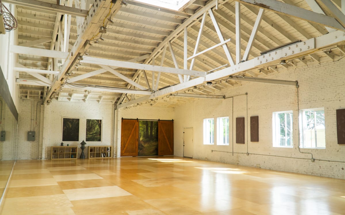 Warehouse Dance Studio with Brick Walls, Wood Floors and Front Stage ...