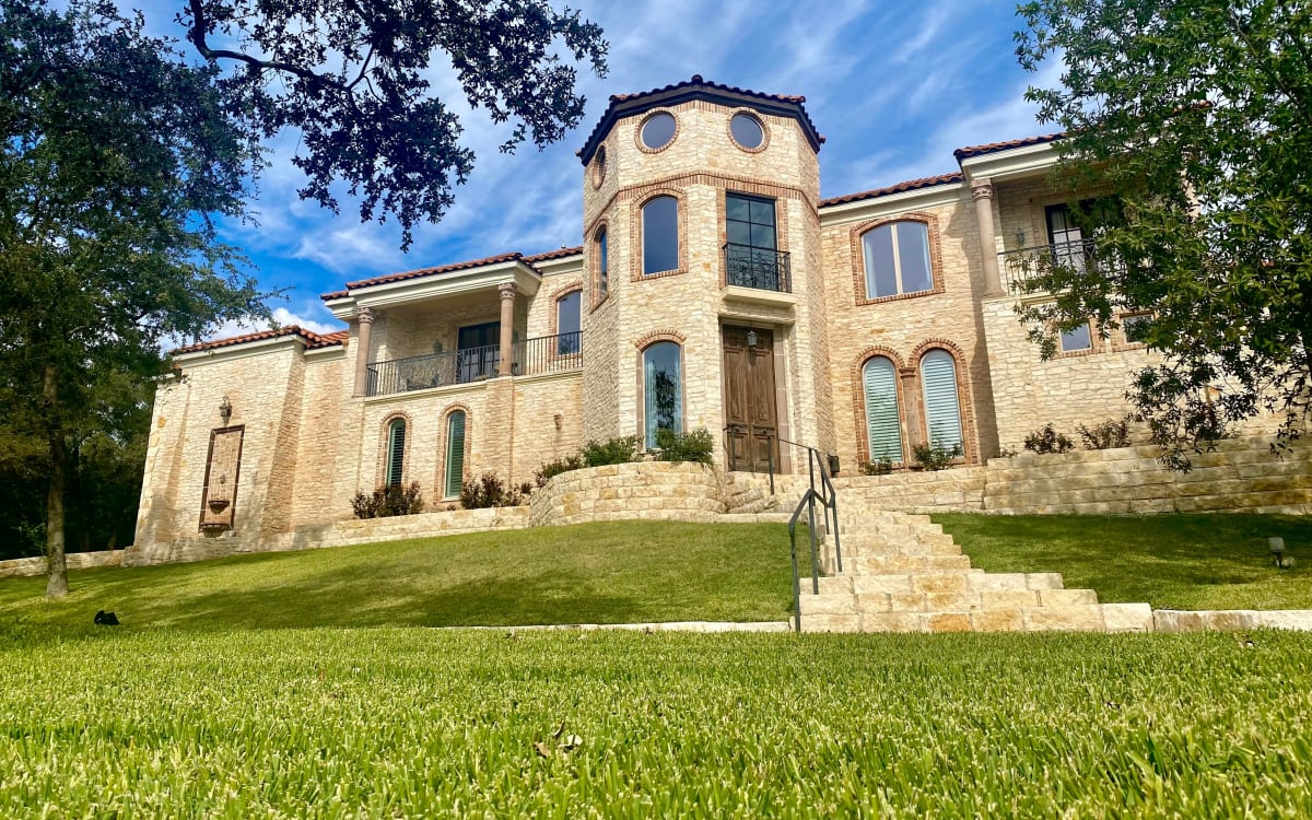 Tuscan style castle with timeless design, extensive kitchen, and lush ...