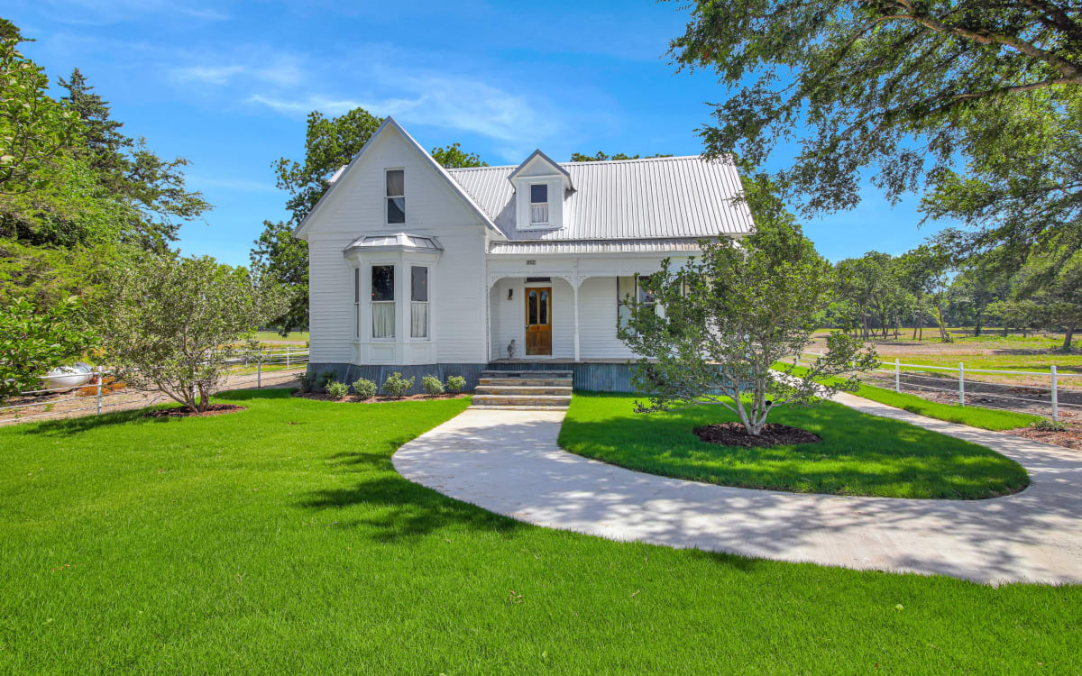 Charming 1905 farmhouse surrounded by large mature trees on secluded ...