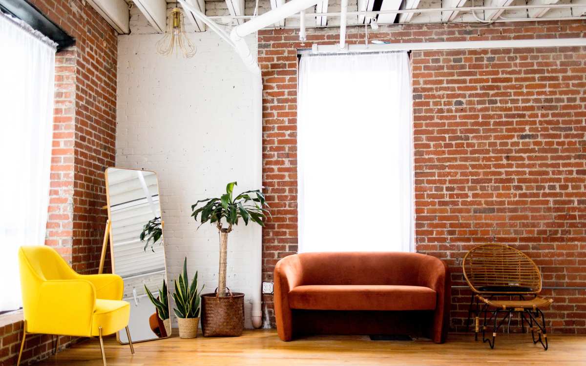 Modern Downtown Studio Loft with Exposed Brick and Hardwood Floors ...