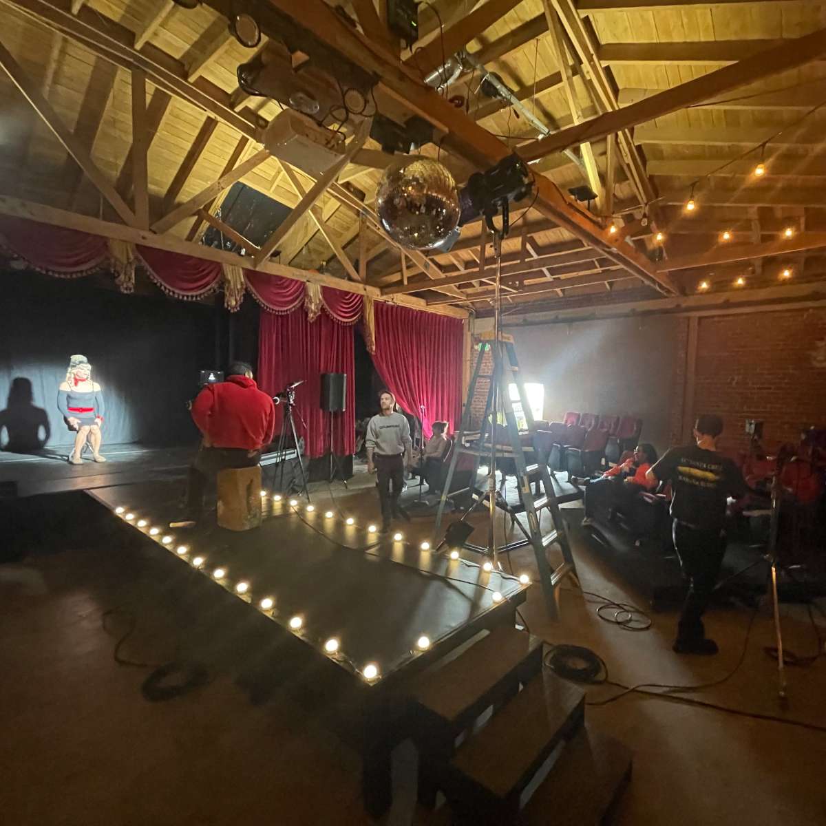 Gorgeous Bohemian theater with Red Velvet Curtains and Wood Beam ...