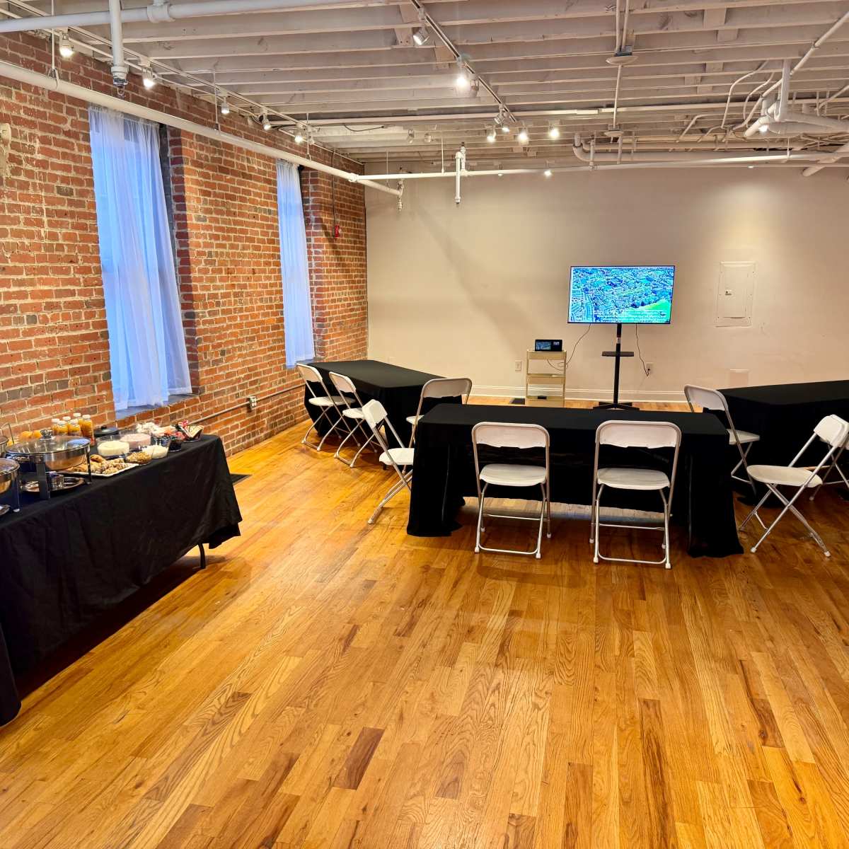 Modern Downtown Studio Loft with Exposed Brick and Hardwood Floors ...