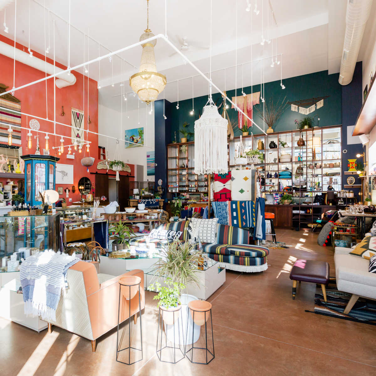 Bright New Storefront with high lofted ceilings and stylish props and ...