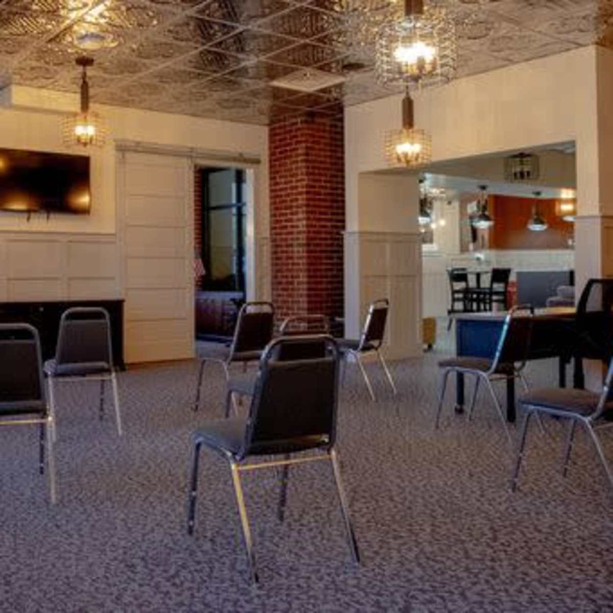 Urban, main street Coworking and Venue hall space with a rustic ...