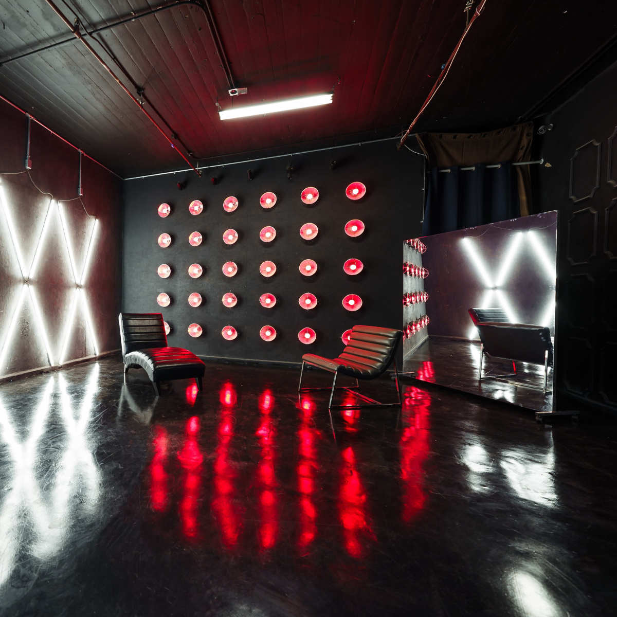 Blackout studio with RGB Astera LED light wall, Large X lights and ...