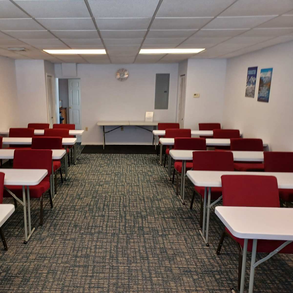 Just remodeled Professional meeting room with training tables and ...