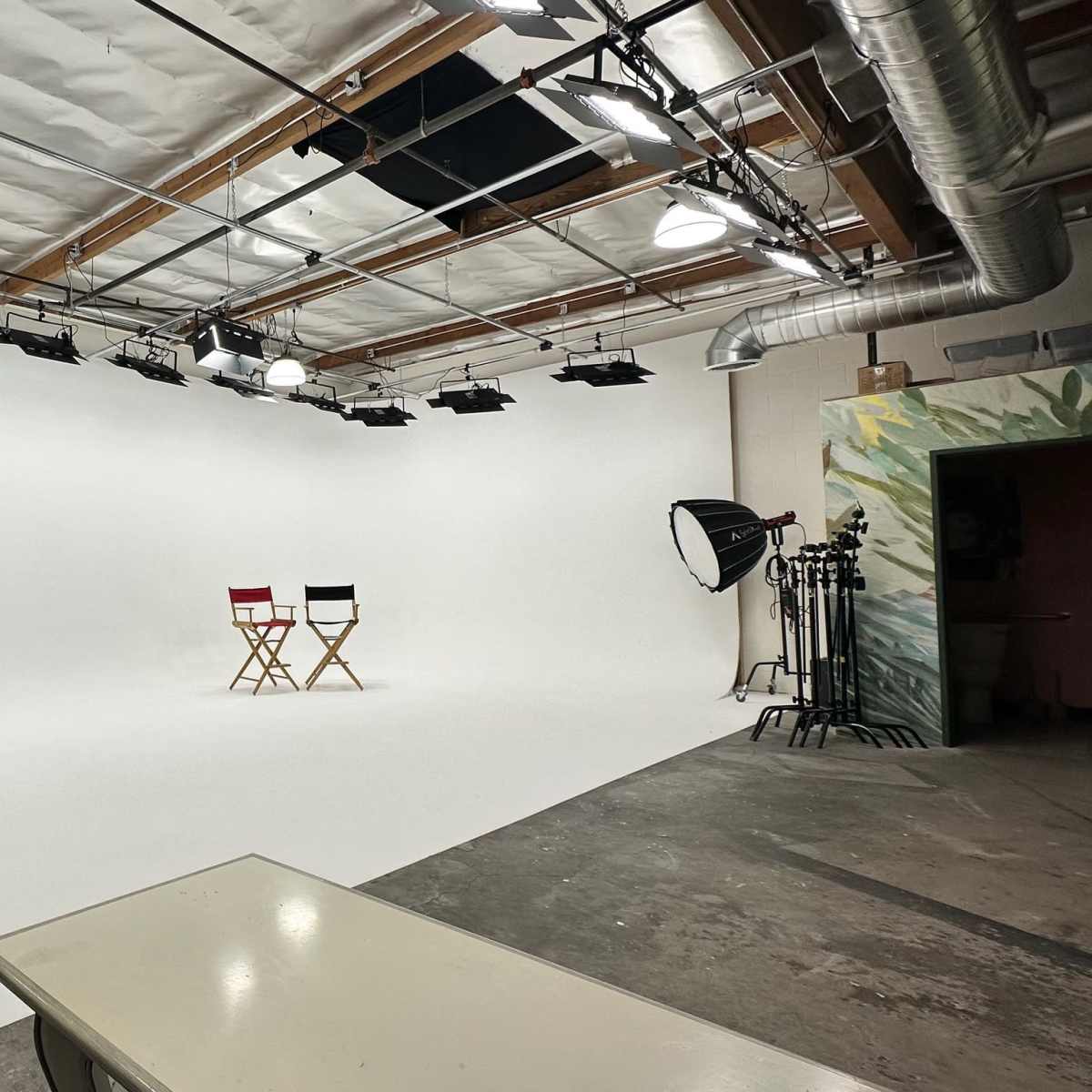 Studio with fully lit cyclorama wall for photo/video/film production ...