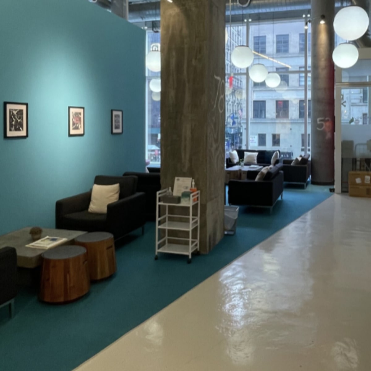 Stylish midtown lounge with floor to ceiling windows, New York, NY ...