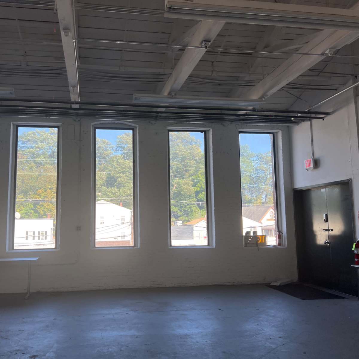 Bright Studio Space with Pretty, Pitched Wood Plank High Ceiling & Wall ...