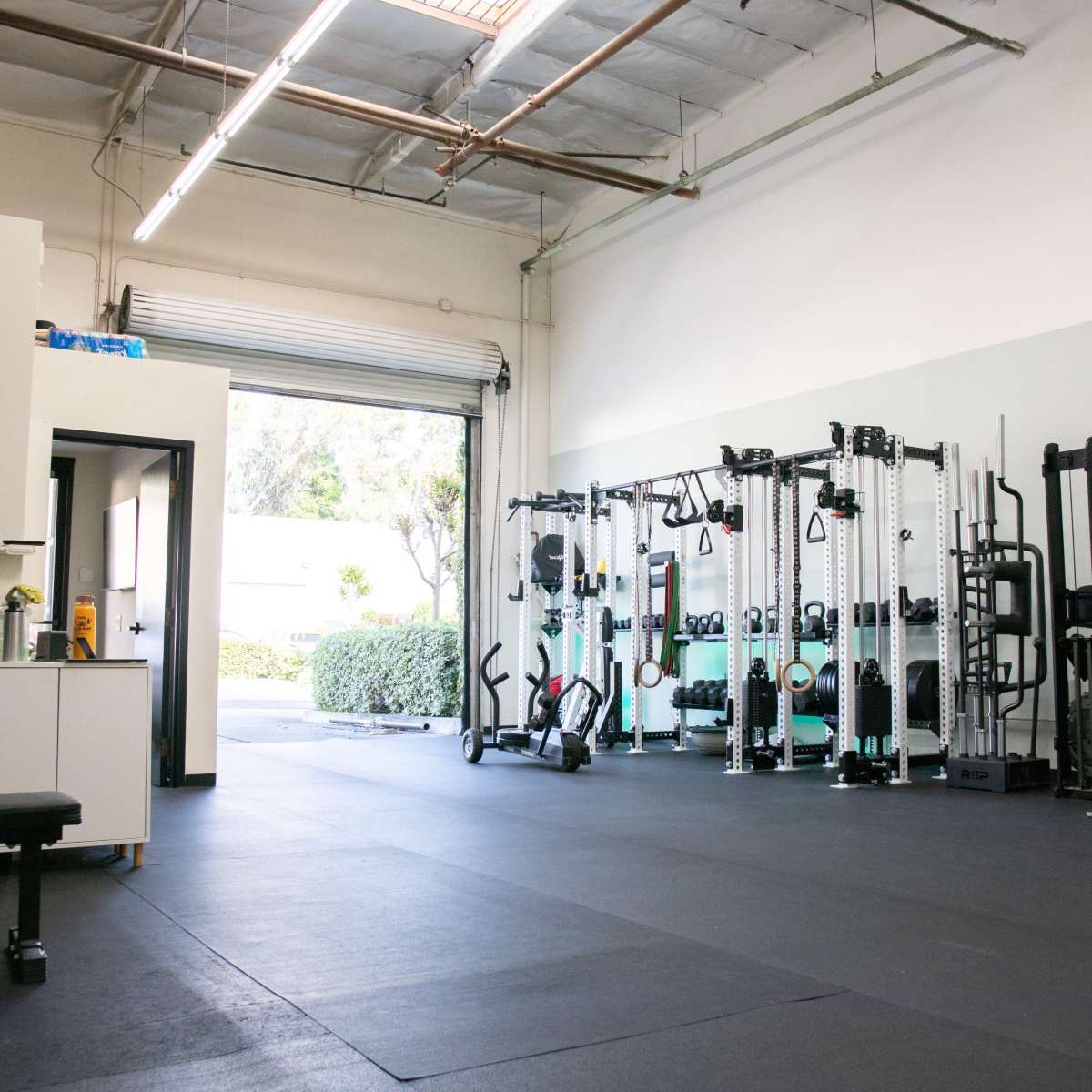 Modern Premium Fitness Studio Gym w/ High Ceiling & Rolling Gate ...