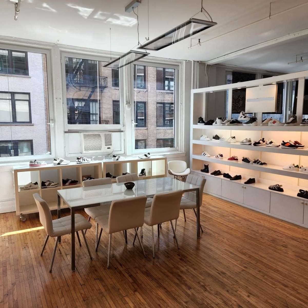 Sunny showroom with displays and sitting areas, New York, NY | Event ...