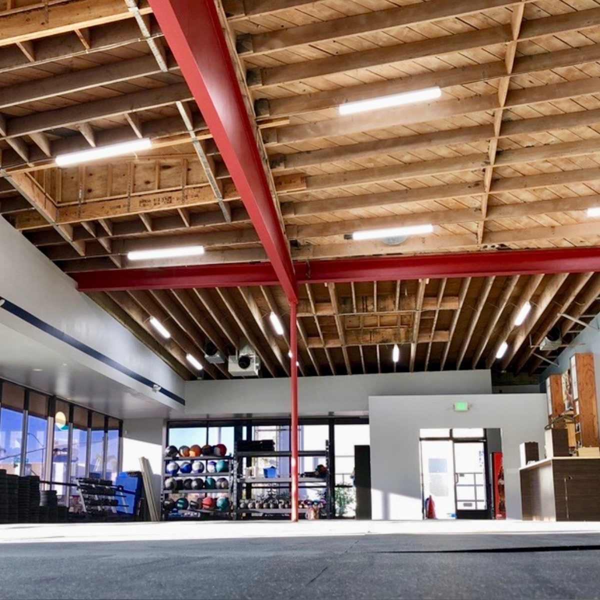 Industrial open gym space with floor to ceiling windows, Culver City ...