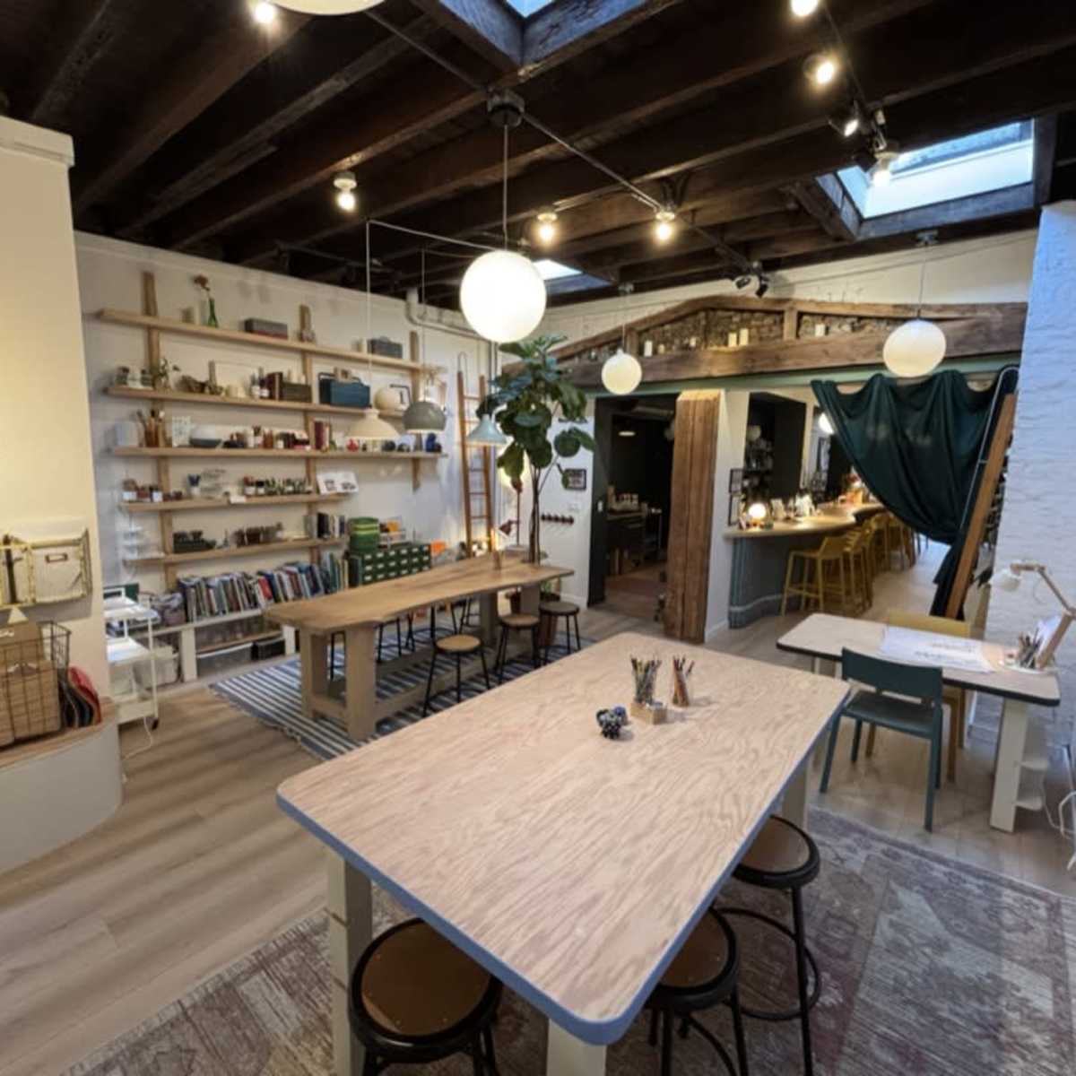 sky lit multi-use space with hand-crafted decor and plants galore ...