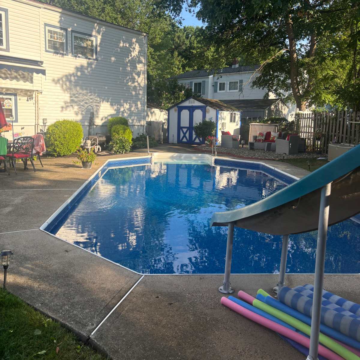 Country Club setting in backyard with pool ( seasonal) fire pits, bar ...