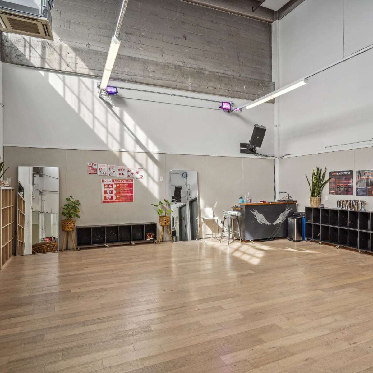 Dynamic dance studio with wall mirrors, sound system, and more ...