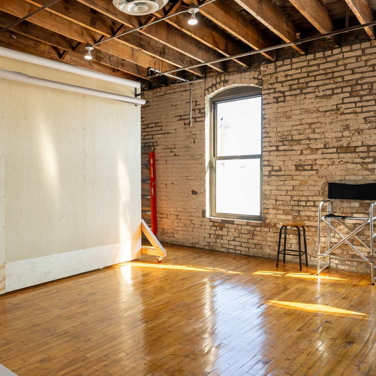 Historic Photo/Video Studio With Exposed Brick and Backdrops ...