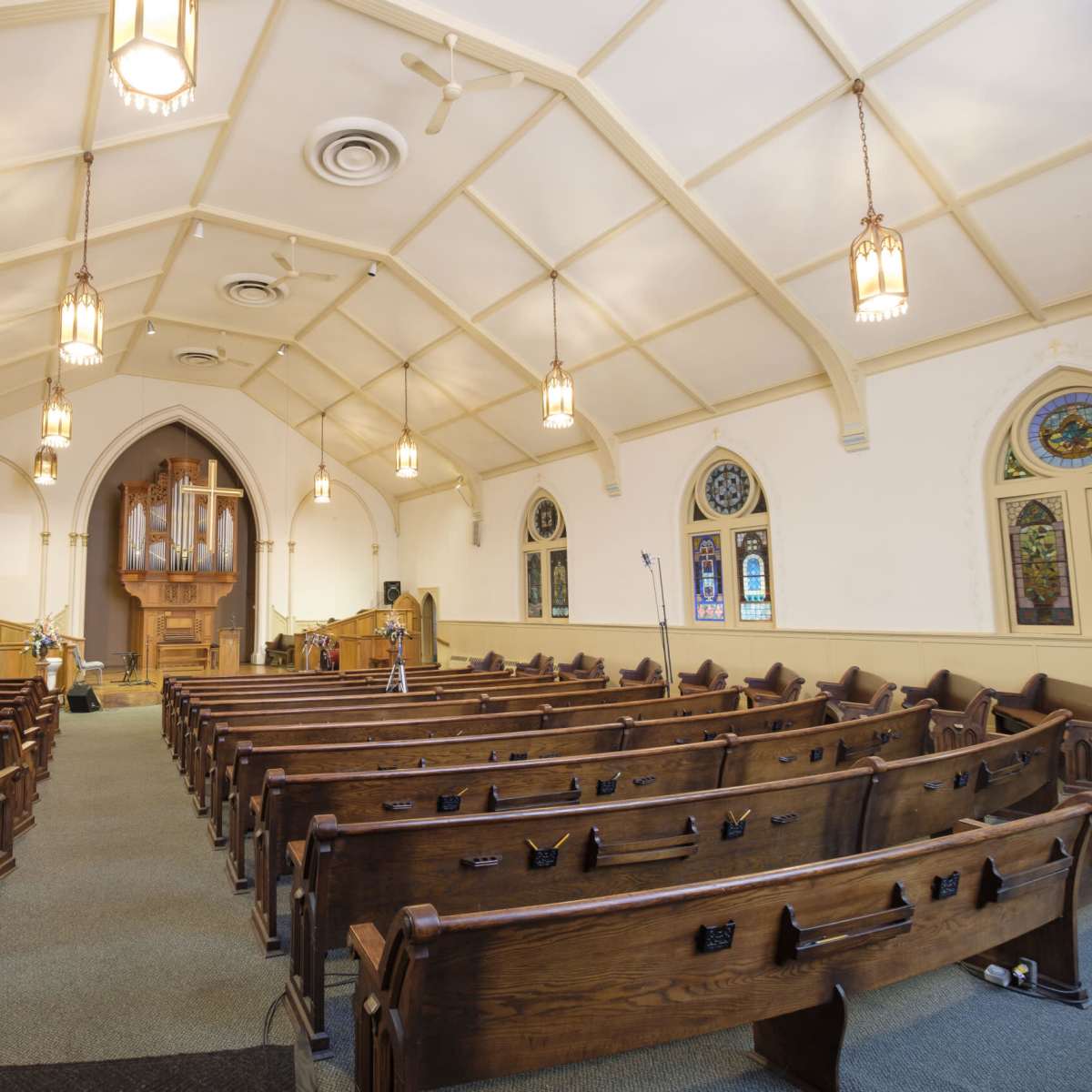 Sanctuary in Urban Former Church with Beautiful Stained Glass and ...