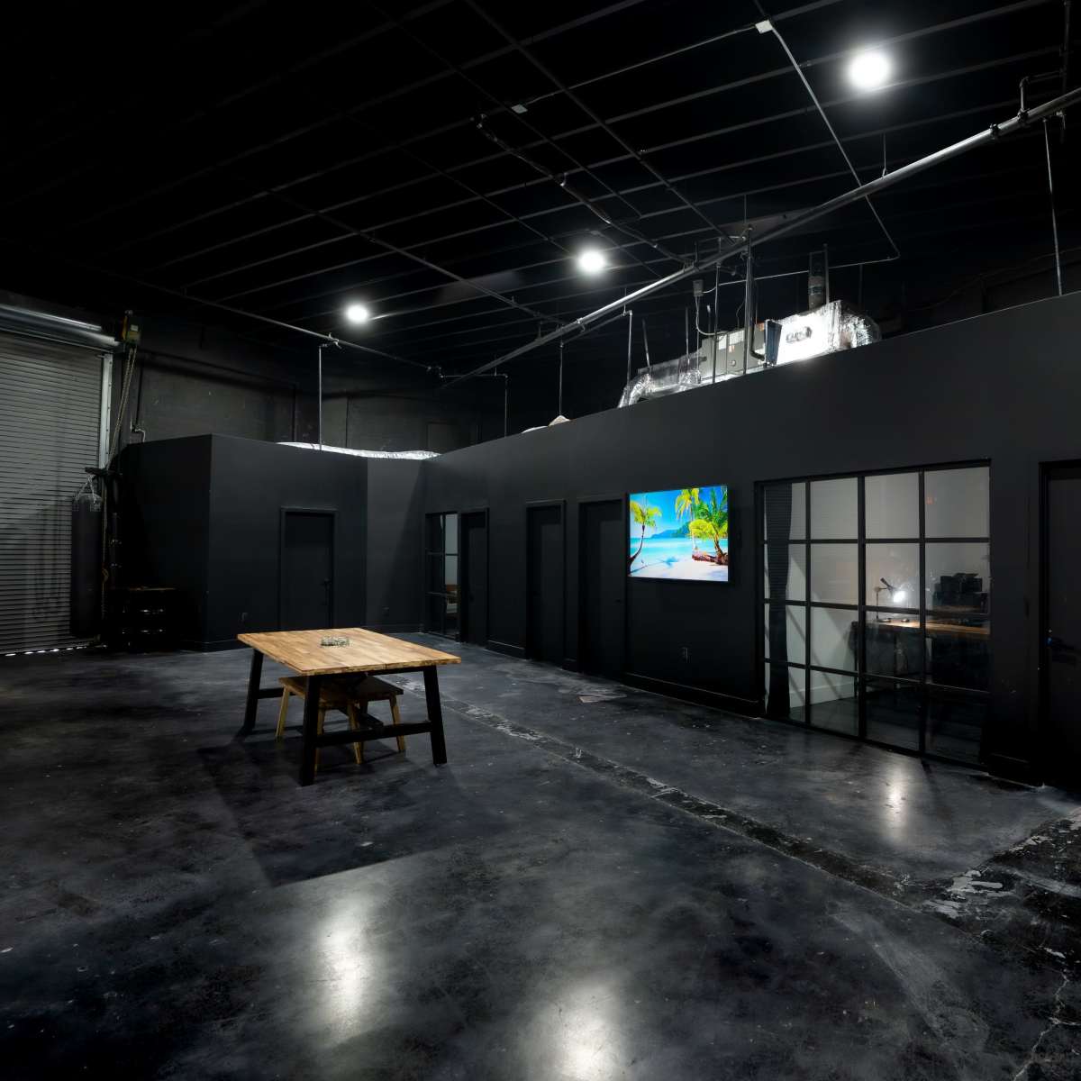 Black Box Media Miami | Multipurpose all black modern warehouse with ...