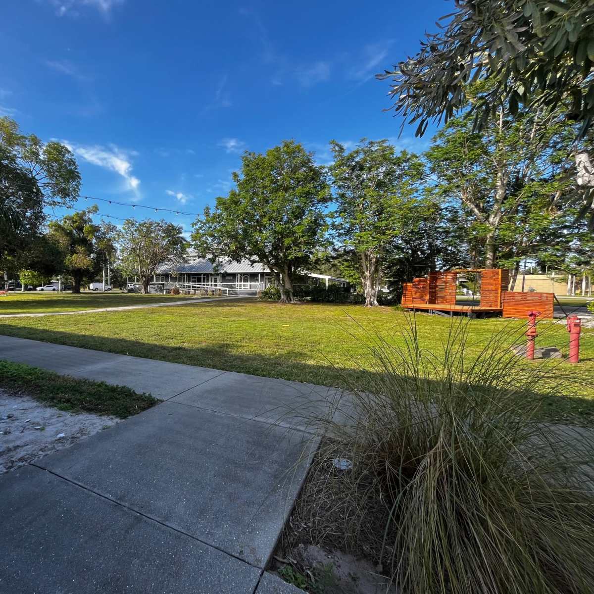 Outdoor Grassy Space with Stage and Café Lighting, Fort Myers, FL ...