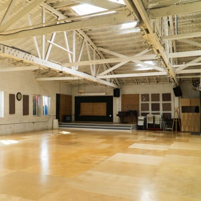 Warehouse Dance Studio with Brick Walls, Wood Floors and Front Stage ...