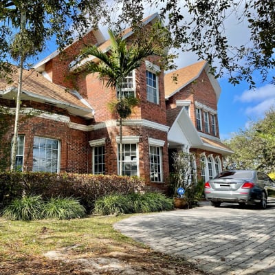 English Manor Style Brick House with Grand Staircase near The Falls ...