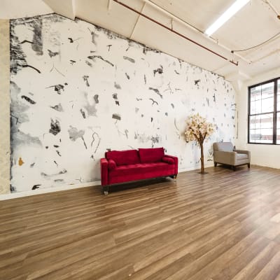 Beautiful photo studio with large round wood window, laminated floor ...