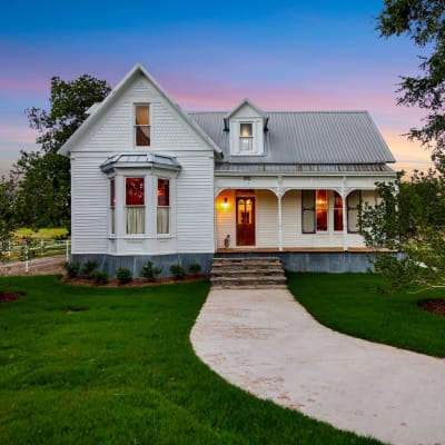 Charming 1905 farmhouse surrounded by large mature trees on secluded ...