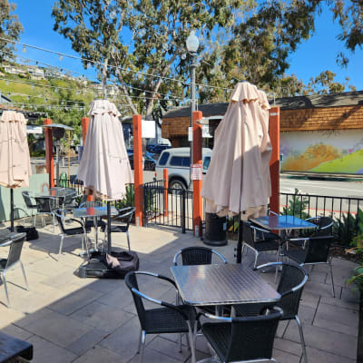 Cozy Downtown Restaurant Patio, three-minute walk from the Main Beach ...