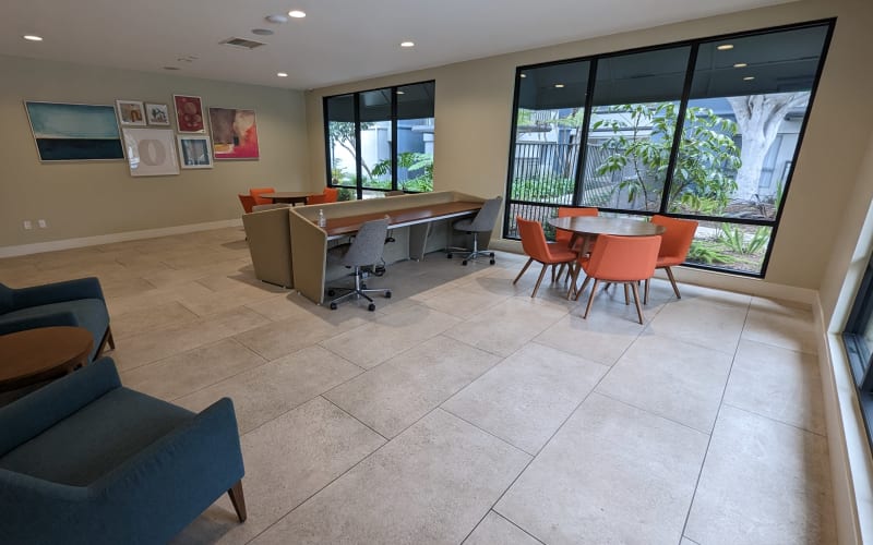 Bright Wi-Fi Lounge w/ View, Table & Chair Seating and Cubicle Break ...