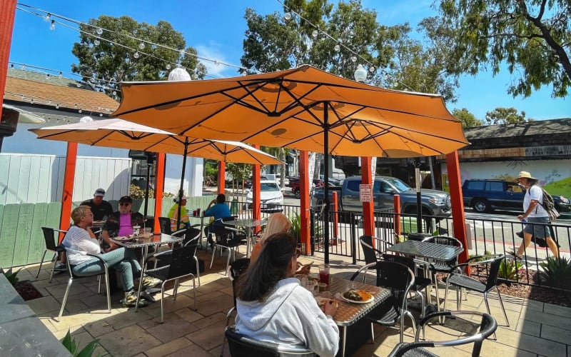 Cozy Downtown Restaurant Patio, three-minute walk from the Main Beach ...