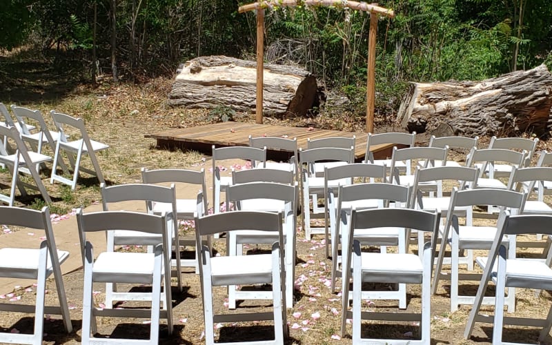 Lush Country Mountain Rustic Meadow with Covered Wagons in a Dark Sky ...