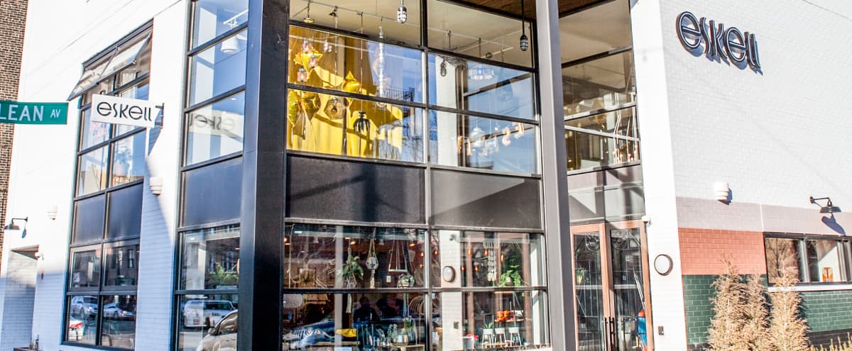 Bright New Storefront with high lofted ceilings and stylish props and ...