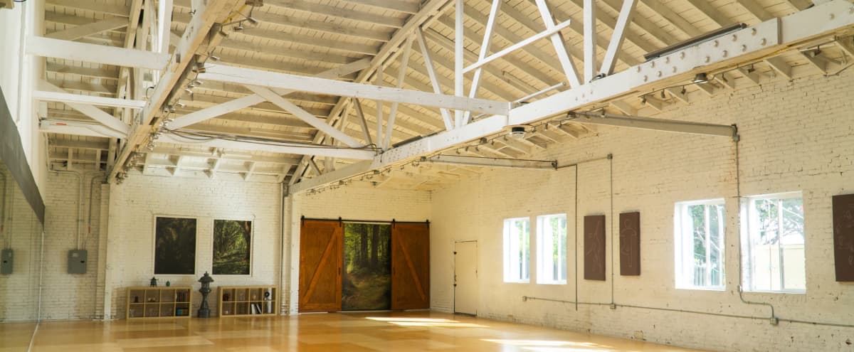 Warehouse Dance Studio with Brick Walls, Wood Floors and Front Stage ...