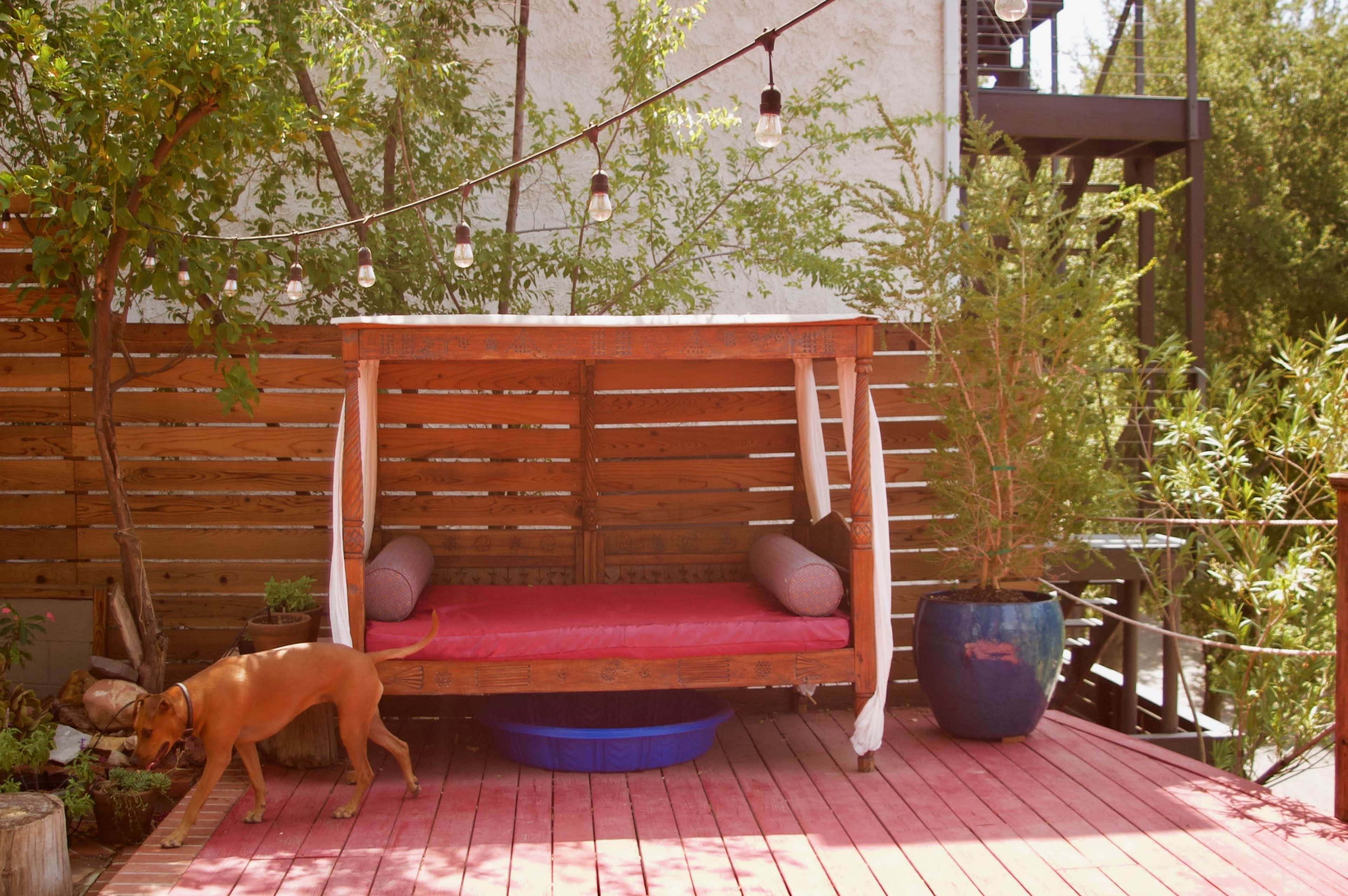 Green outdoor parklike hillside deck available for gatherings, dinners ...