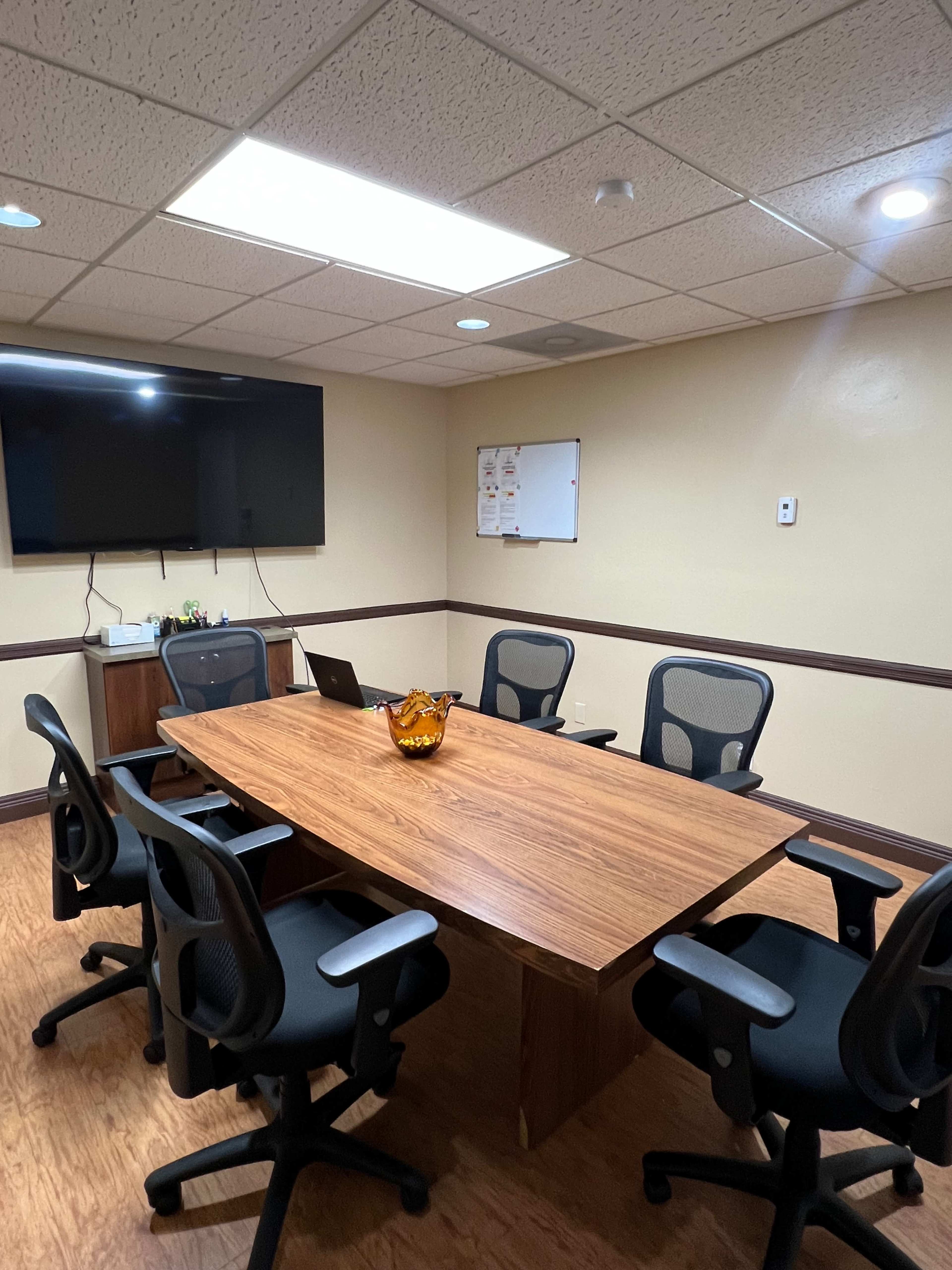 Comfortable conference room, CORAL SPRINGS, FL | Off-Site | Peerspace