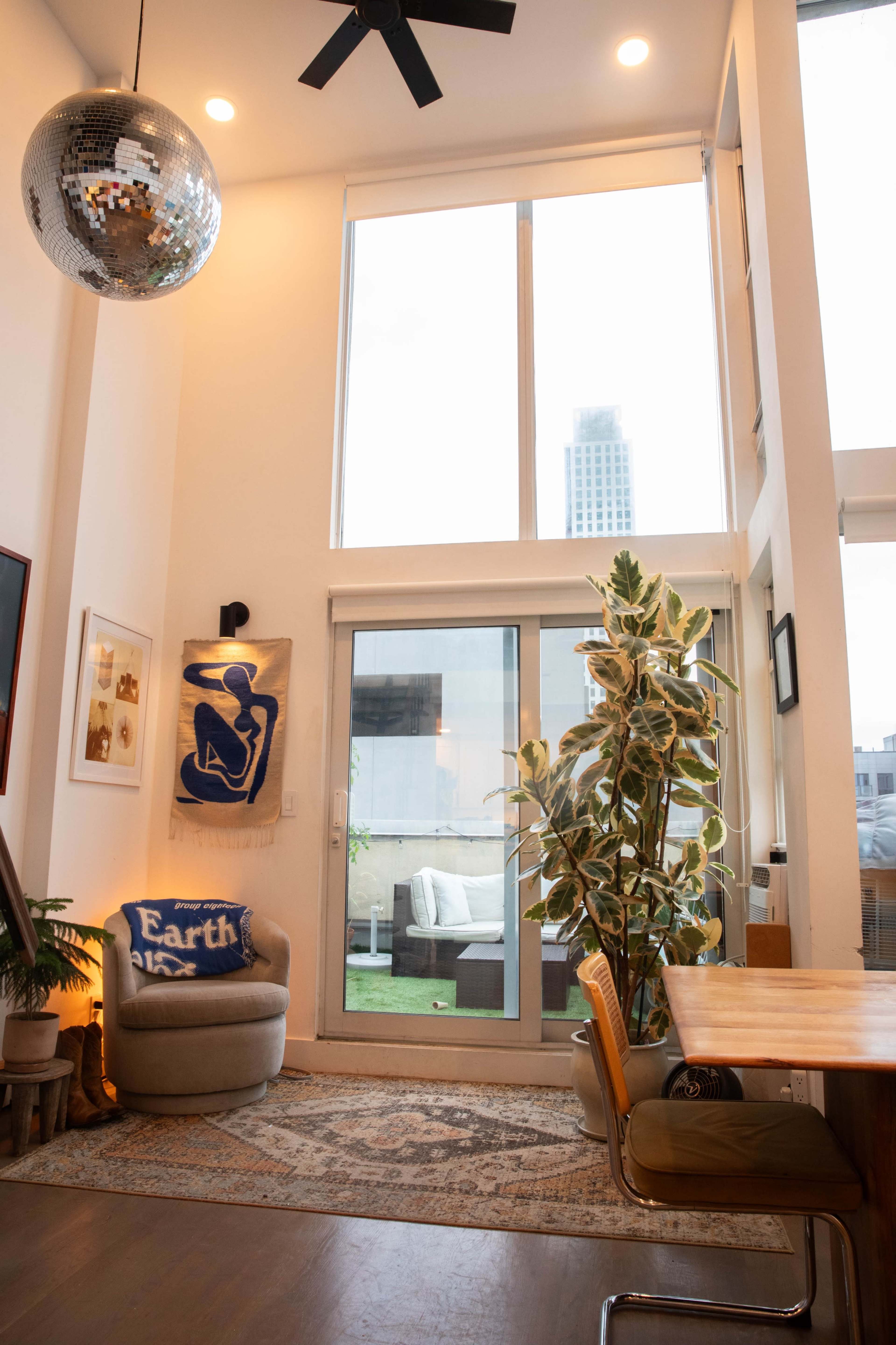 Eclectic Lofted Apartment with Floor-to-Ceiling Windows + Balcony ...