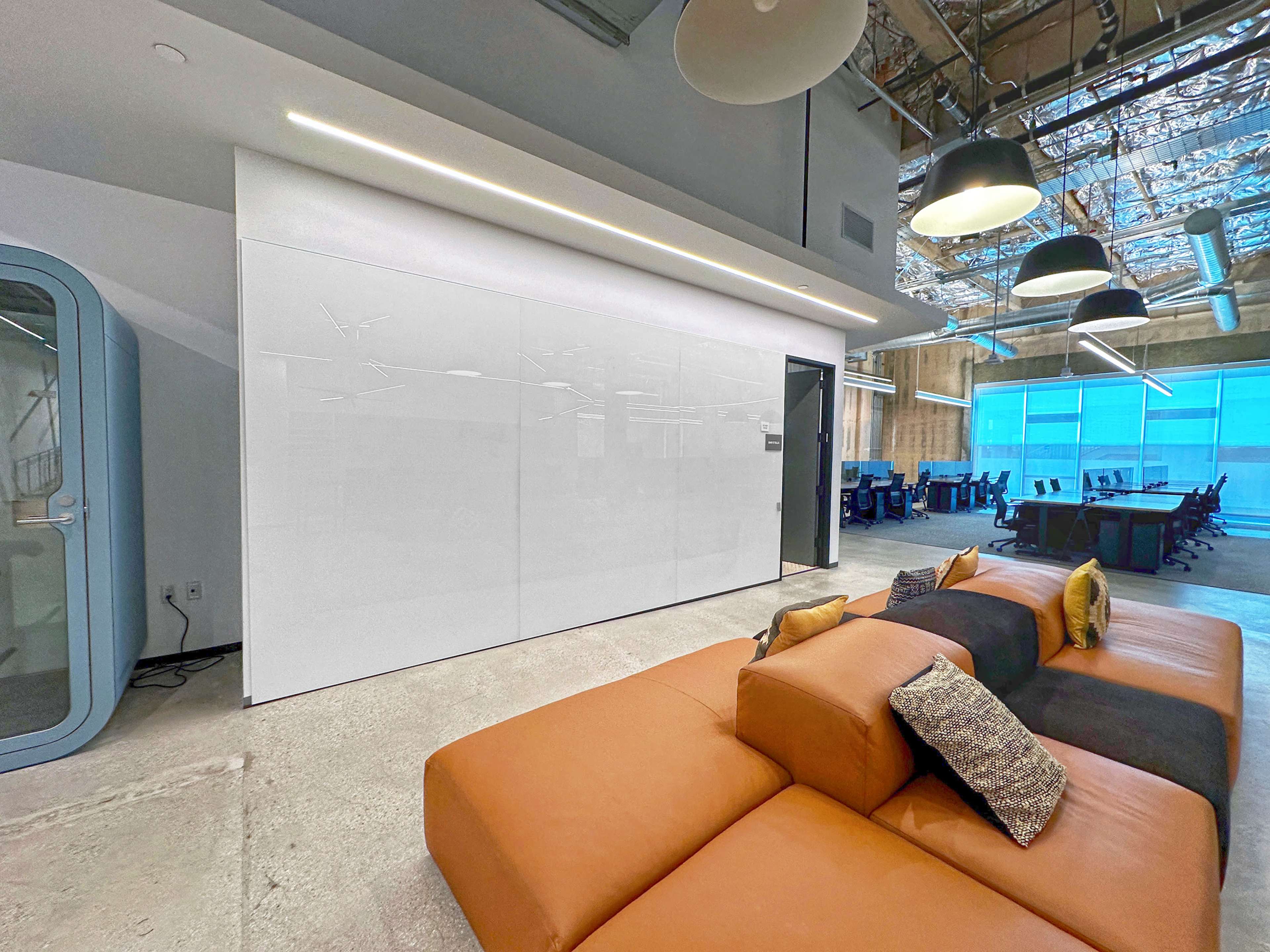 3rd Floor Modern Industrial Meeting Area with Large Whiteboard Wall ...