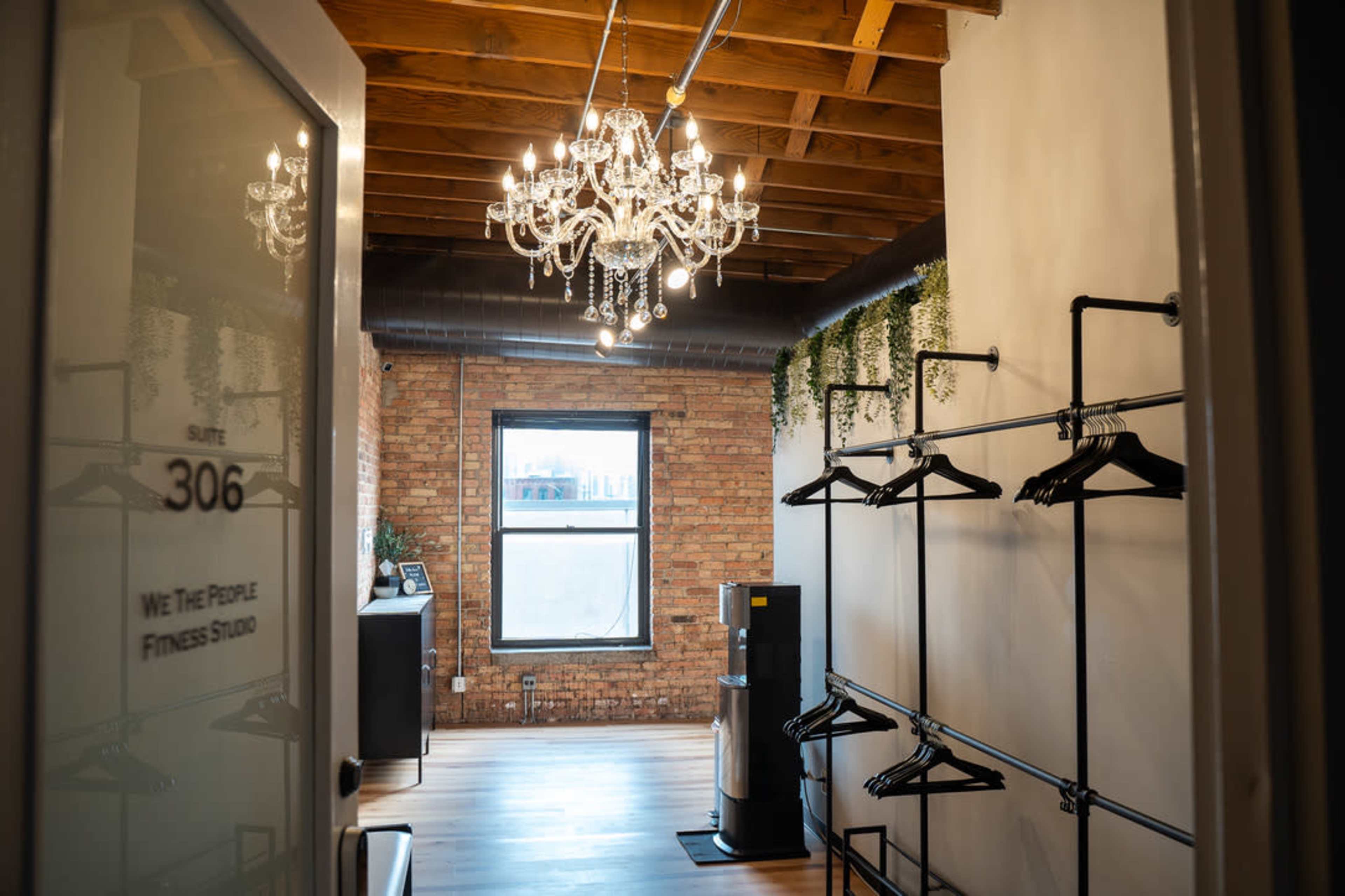 Beautiful timber loft fitness studio with equipment, skyline view and ...